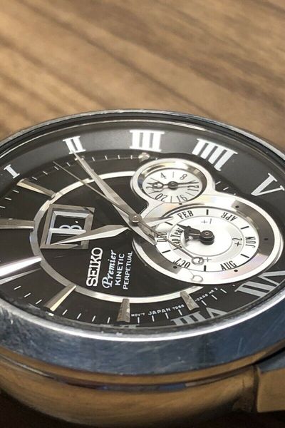 Seiko Premier Kinetic Perpetual Calendar SNP021 Price as of October 2025 | WatchCharts