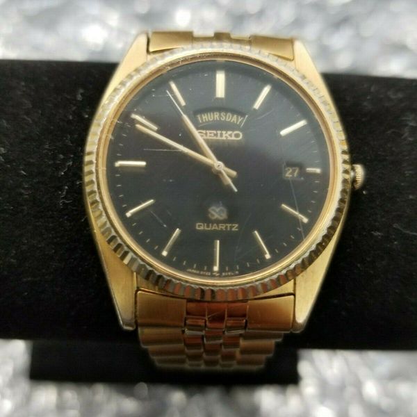 Seiko Quartz SQ Gold Tone Men's Watch 5Y23-8A69 Date Day Stamp Runs | WatchCharts