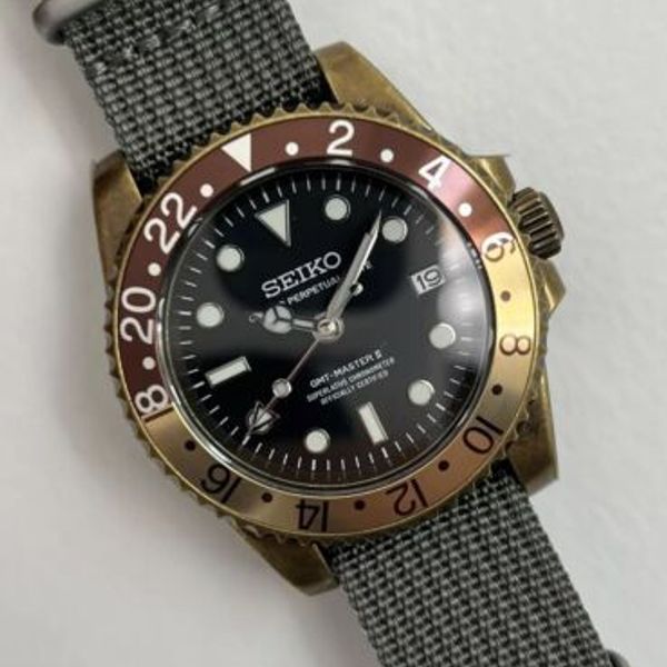 Root beer! Vintage SEIKO Mod Real GMT Functions | WatchCharts Marketplace