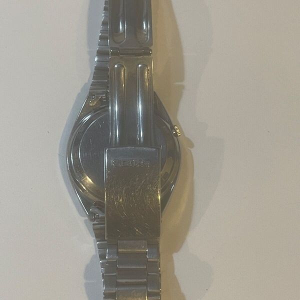 Seiko 5 7009-3040 Red Ticker Military Dial Day/Date Automatic | WatchCharts Marketplace