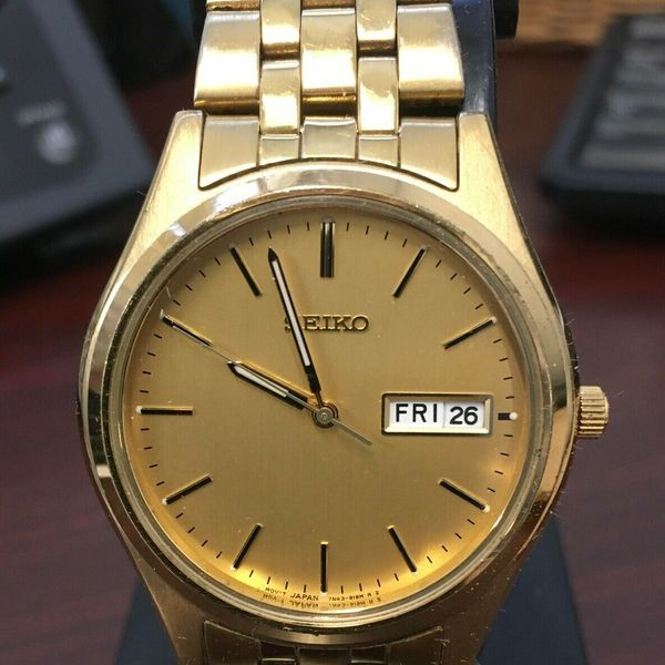 Vintage Seiko 7N43-9048 Mens Gold Tone Quartz Day/Date New Battery Super Clean! | WatchCharts