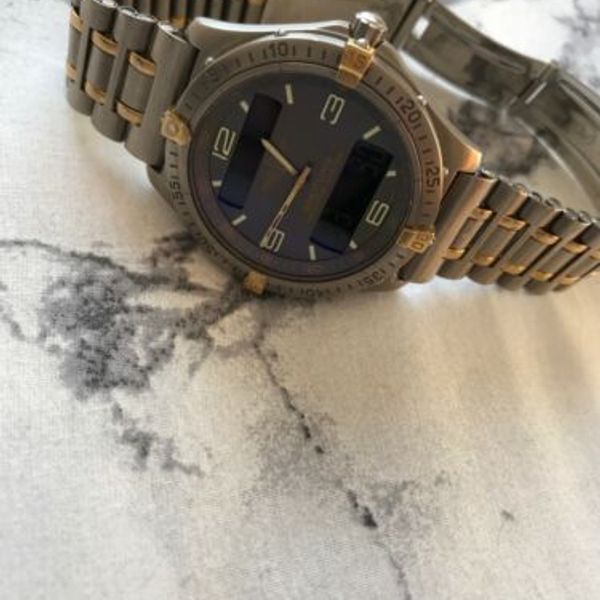 Breitling Aerospace Titanium and Yellow Gold Gents Watch- ETA 988.332 ...