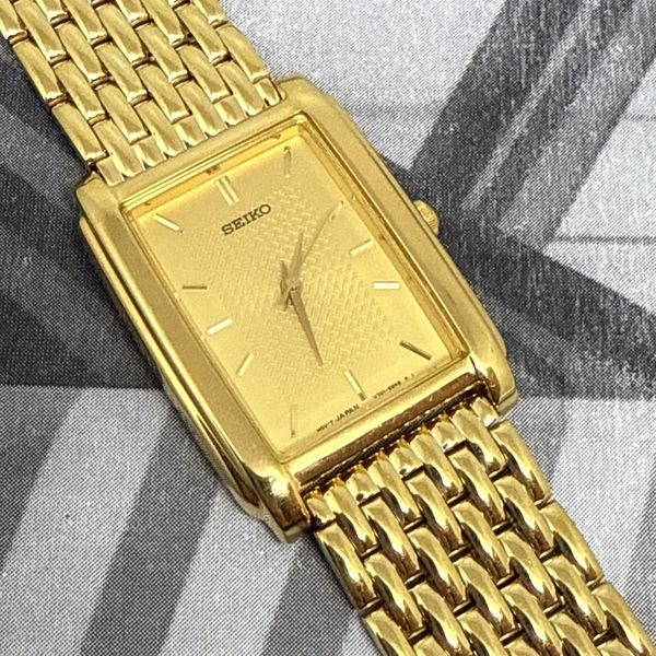 Vintage Seiko V701-5E40 Tank Dress Watch Gold Tone Champagne Dial Mens Unisex | WatchCharts ...