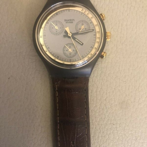 SWATCH WATCH SCM100 GOLDFINGER CHRONOGRAPH 1991 | WatchCharts