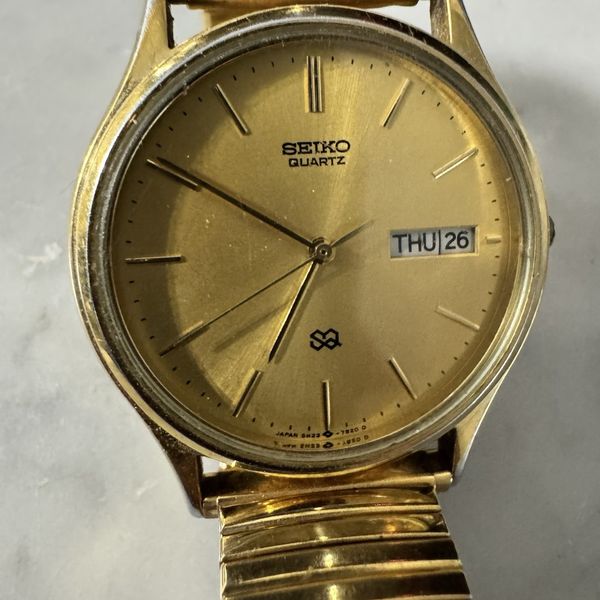 Seiko Men's Quartz Watch SQ Gold Tone Day/Date 36mm 1980s Vintage *Rare* Speidel | WatchCharts ...