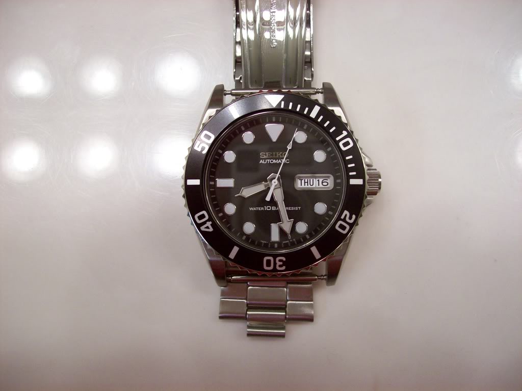 FS: Seiko SKX031 on bracelet | WatchCharts