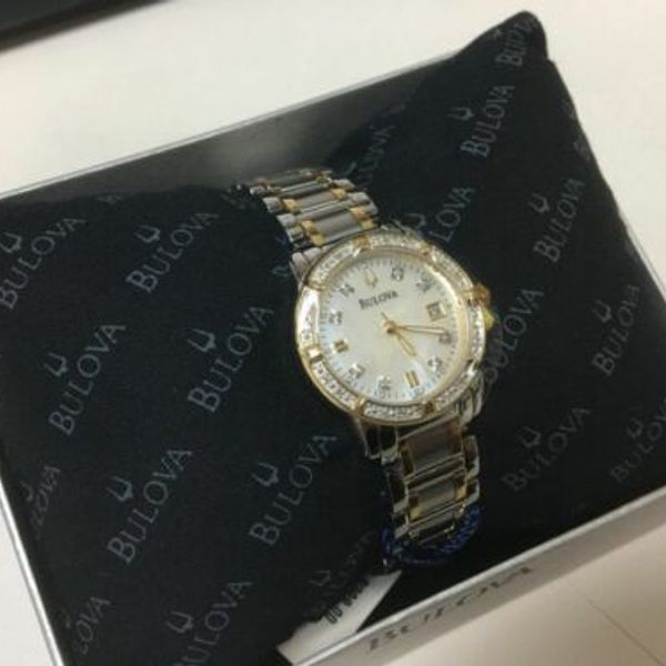 98r107 Womans Bulova Yellow Gold Diamond Bezel and Dial Watch ...