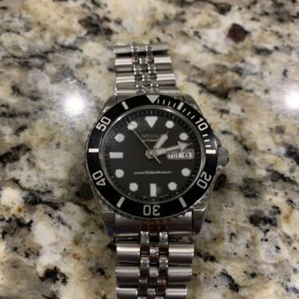 Seiko SKX031 | WatchCharts