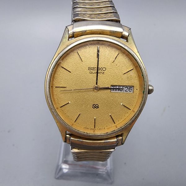 Vintage Seiko SQ Watch Men Gold Tone Gold Dial DayDate 8223-7109 PARTS | WatchCharts Marketplace
