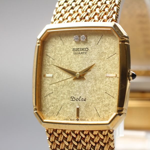 Vintage 1984 *NEAR MINT* SEIKO Dolce 9521-5210 2P Diamonds Tank Shape Men Watch | WatchCharts ...