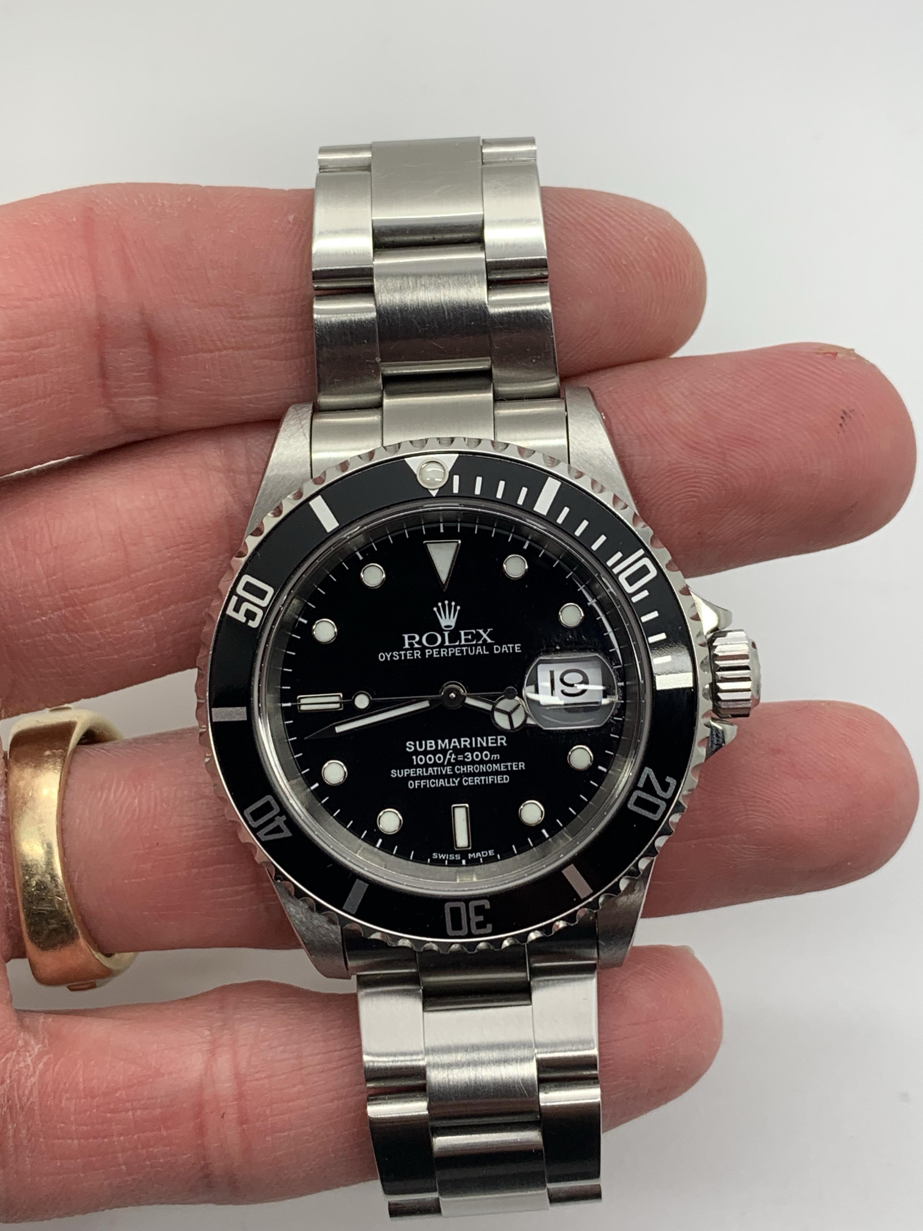 2002 Rolex 16610 Submariner Excellent unpolished holes case | WatchCharts
