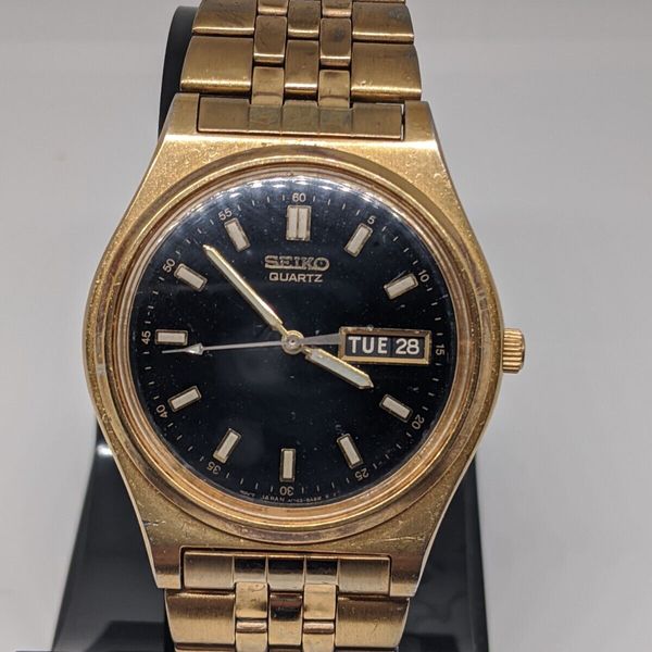 Seiko Quartz Watch V743-8A20 Gold Black Dial Day Date Metal New Battery Working | WatchCharts ...