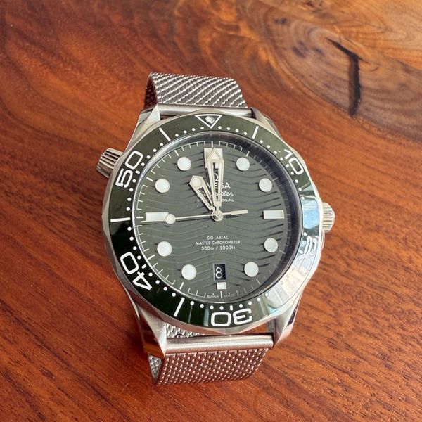 Omega Seamaster SMP 300 Green Rubber | WatchCharts Marketplace