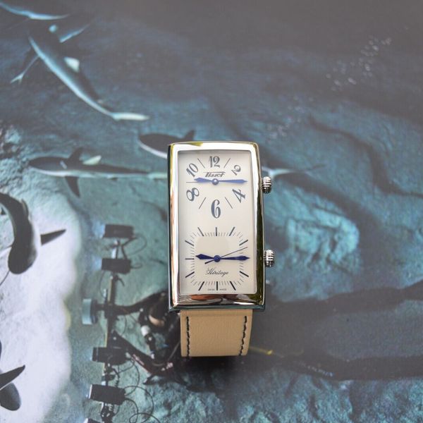 Montre Tissot Heritage dual Time Swiss Made | WatchCharts Marketplace