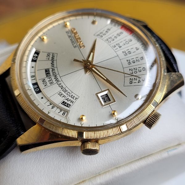 ORIENT Olympia Calendar - men's wristwatch | WatchCharts Marketplace