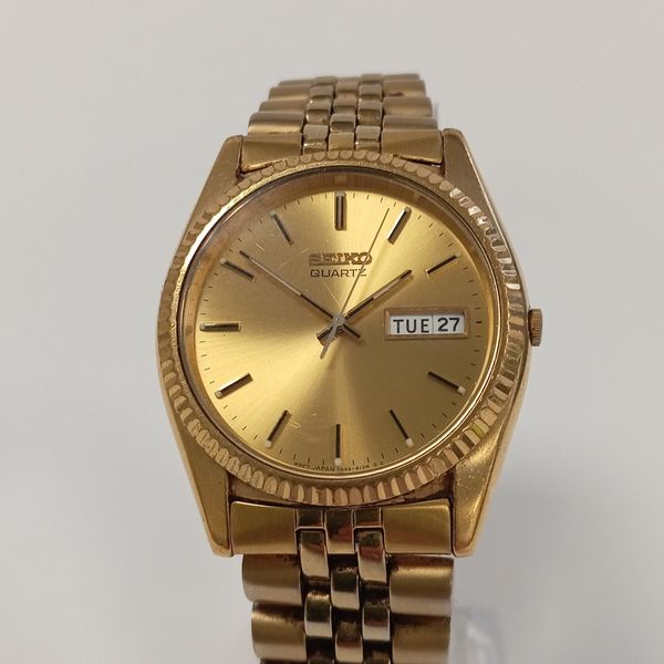 Vintage Seiko Quartz Gold Watch with Day-Date Display 7N43-8111 34mm Dial | WatchCharts Marketplace