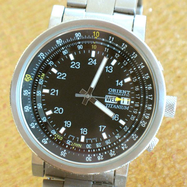 Price Drop: Titanium Orient slide rule auto CEM58001B | WatchCharts ...