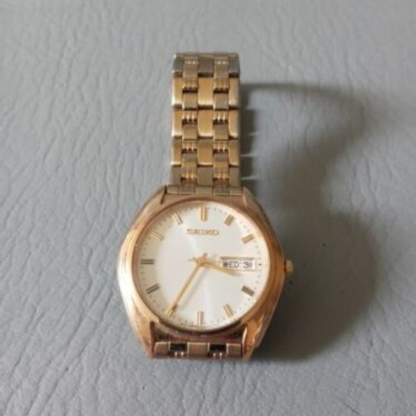 Mens Seiko V743-8069 Quartz Gold Tone Stainless Steel Bracelet Watch | WatchCharts