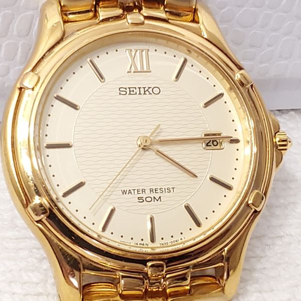 Vintage Seiko Men's Gold Tone Date Quartz Watch One Jewel S Steel WR 50 Meters | WatchCharts ...