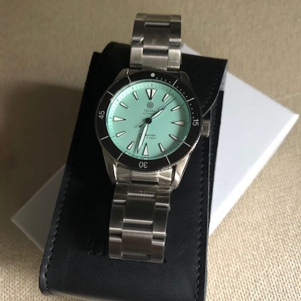SOLD Traska Freediver - Mint Stainless with Sapphire insert | WatchCharts