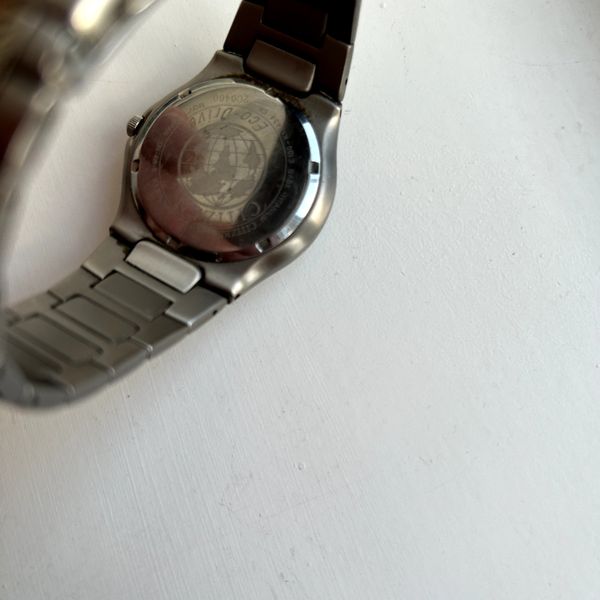 Citizen Men's Eco-Drive Titanium WR-100 With Day Date Bracelet Watch ...