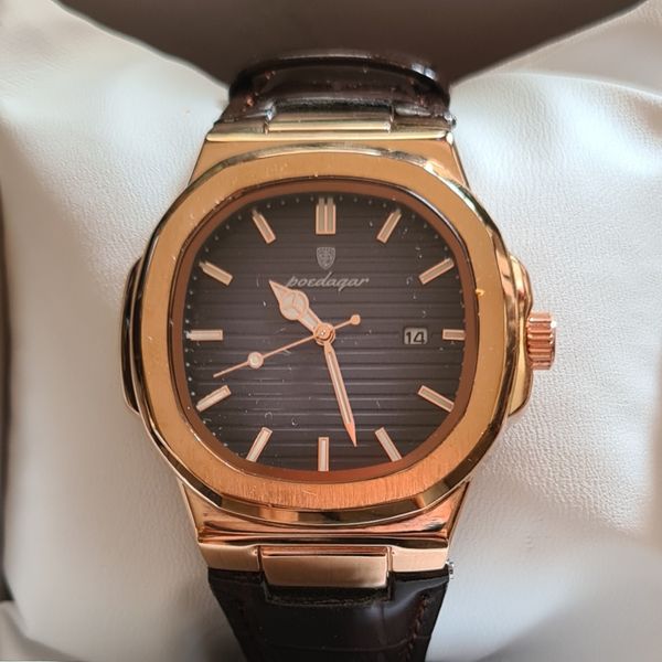 Quartz watch with a spare battery in box-brand Poedagar | WatchCharts ...