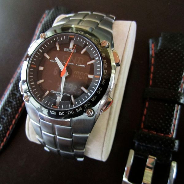 Seiko Sportura SNJ005 Worldtimer Analog-digital | WatchCharts