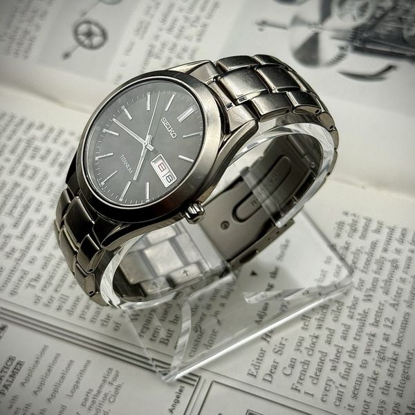 Seiko Titanium Japanese Day/Date quartz 37mm | WatchCharts Marketplace