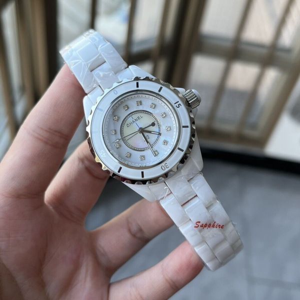 CHANEL-J12-33/38mm Dazzling Colourful Shell Quartz Model | WatchCharts ...