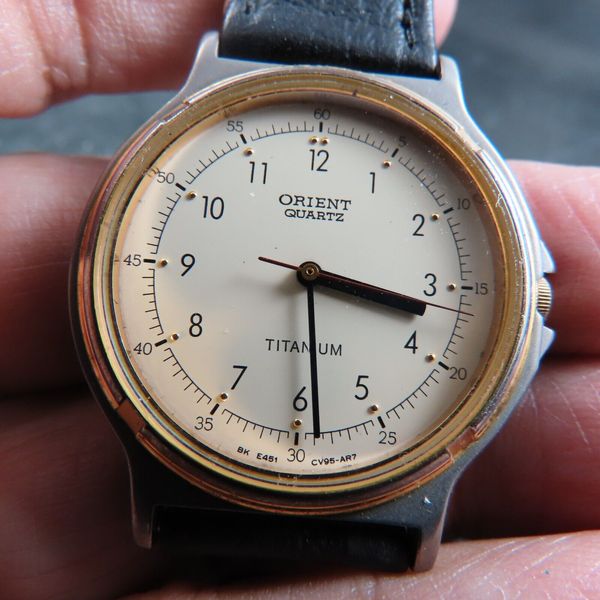 All Titanium Japan Orient Classic Quartz Boy Size Watch | WatchCharts ...