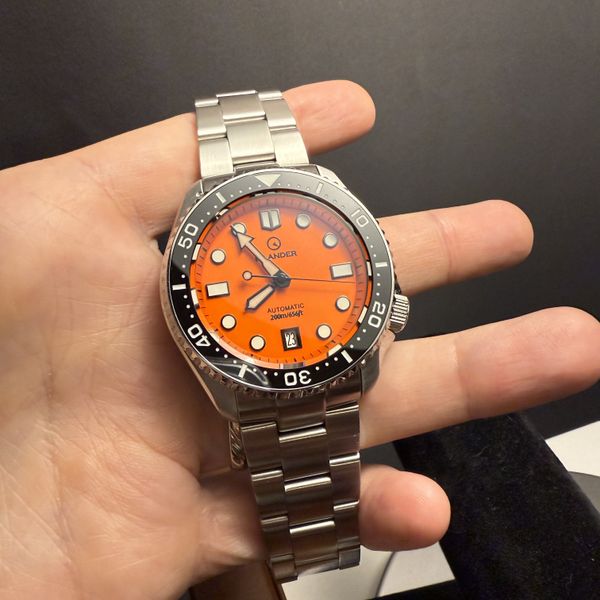 Islander ISL07 Orange dial SKX homage with upgrades | WatchCharts ...