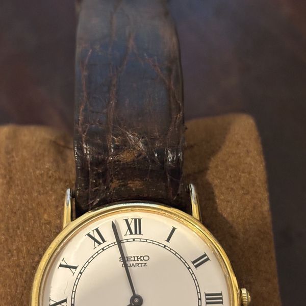 Vintage Men Seiko 5y30-7000 Roman Numeral White Dial Gold Tone w/Alligator Band | WatchCharts ...