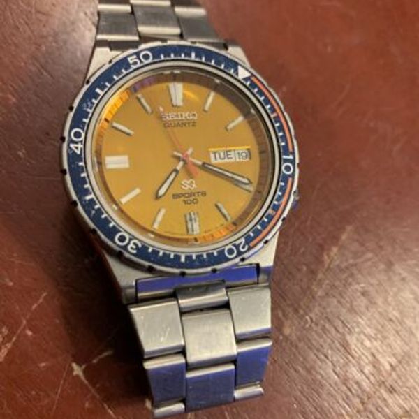 Rare original vintage Seiko SQ 7123-823H Sports 100 Orange dial watch ...