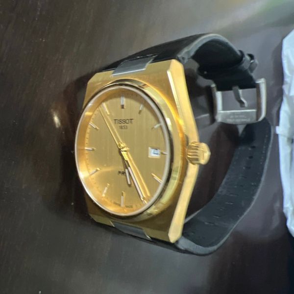 Tissot PRX gold | WatchCharts Marketplace