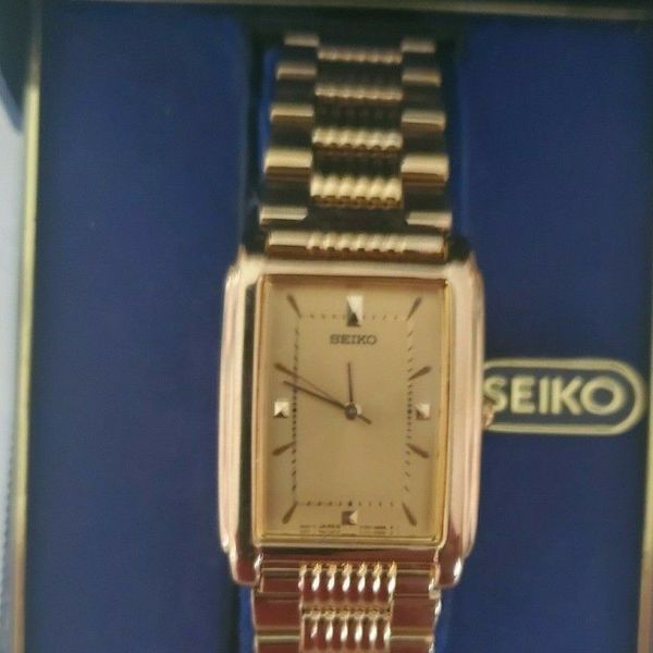 Seiko Gold Tone Quartz V701-5E40 | WatchCharts Marketplace