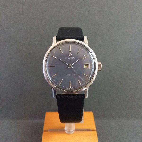 SOLD vintage Omega cal.1010 blue dial SS ref 166.0202 | WatchCharts