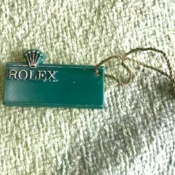 Vintage Rolex green Hang Tag | WatchCharts Marketplace