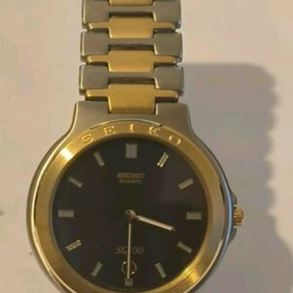 SEIKO 5Y39 1000 SQ100 WATCH BLACK AND GOLD DIAL, Stainless steel. New ...