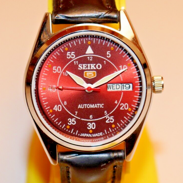 SEIKO 5 AUTOMATIC RED DIAL DAY/DATE WRIST WATCH | WatchCharts