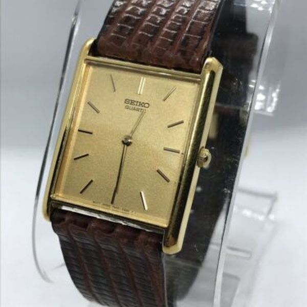 Vintage Seiko Quartz Tank Watch Gold Tone 7N00-5B88 Stainless Back Leather Band | WatchCharts ...