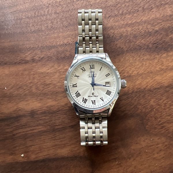 Orient Automatic White Dial Roman Numerals Blue Steeled Hands ...