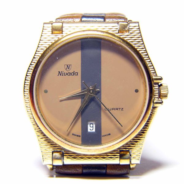 FS: NIVADA Gold Tone Quartz Midsize Vintage Swiss Watch | WatchCharts
