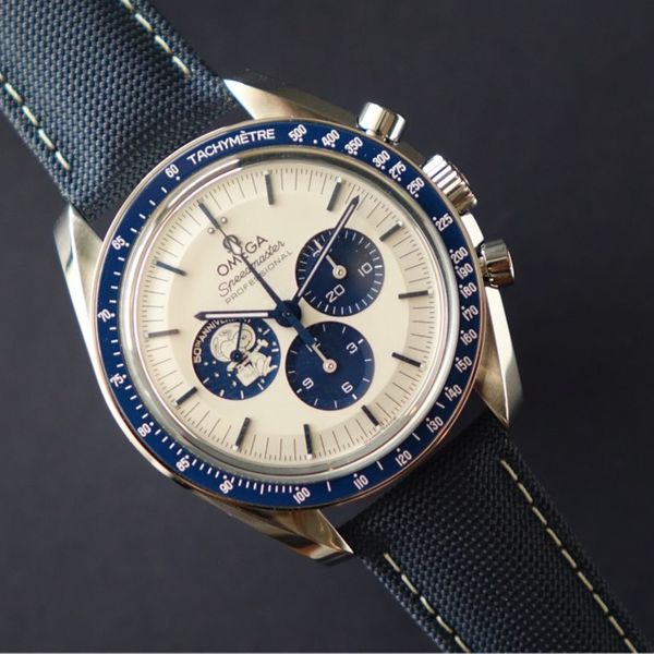 Omega Speedmaster snoopy 50th anniversary silver snoopy award ...