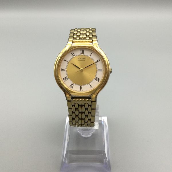 Vintage Seiko Quartz Men Watch 34mm Gold Tone V701-6K69 New Battery 7" | WatchCharts Marketplace