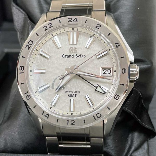 FS: Grand Seiko GMT SBGE285 Mistflake Titanium | WatchCharts Marketplace