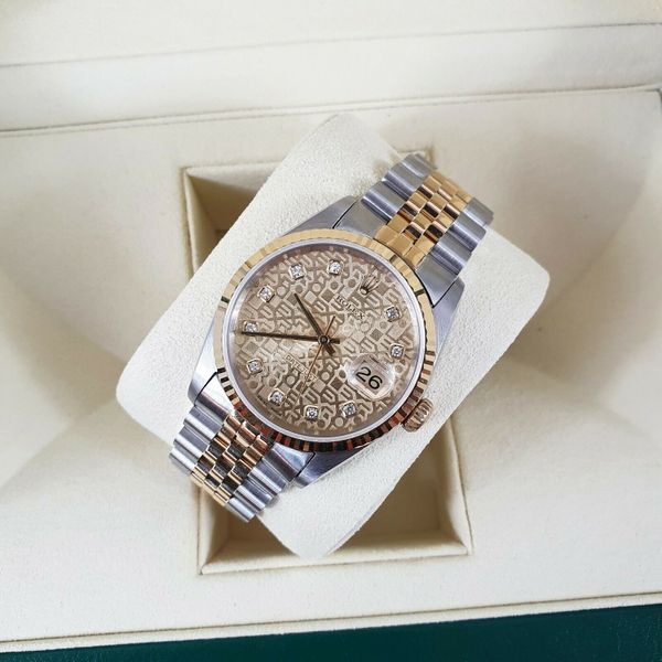 A Gents Rolex Datejust in Steel & 18ct Gold with Factory Champagne ...