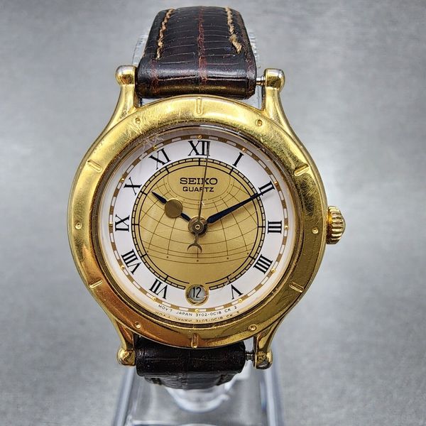 Seiko Age Of Discovery Watch Women 26mm White Dial Gold Tone Date Round ...