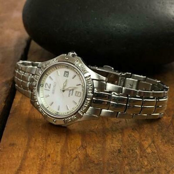 Seiko Coutura 7N82-0GX0 wristwatch with mother of pearl | WatchCharts ...