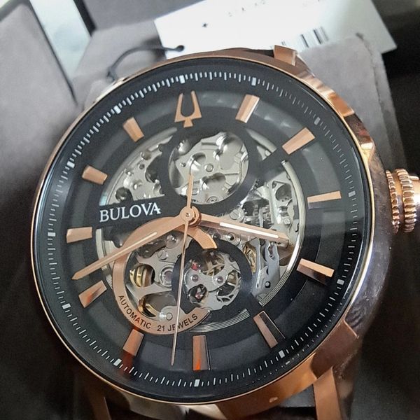 Bulova automatic skeleton rose gold tone watch | WatchCharts Marketplace