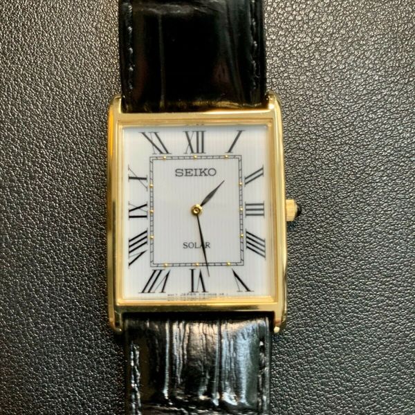 Seiko Men's Solar White Dial Leather Strap Watch SUP880 | WatchCharts Marketplace